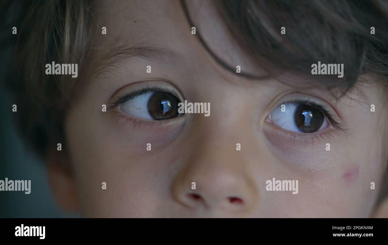 Child macro close up eyes and face looking at camera. Small boy kid eye ...