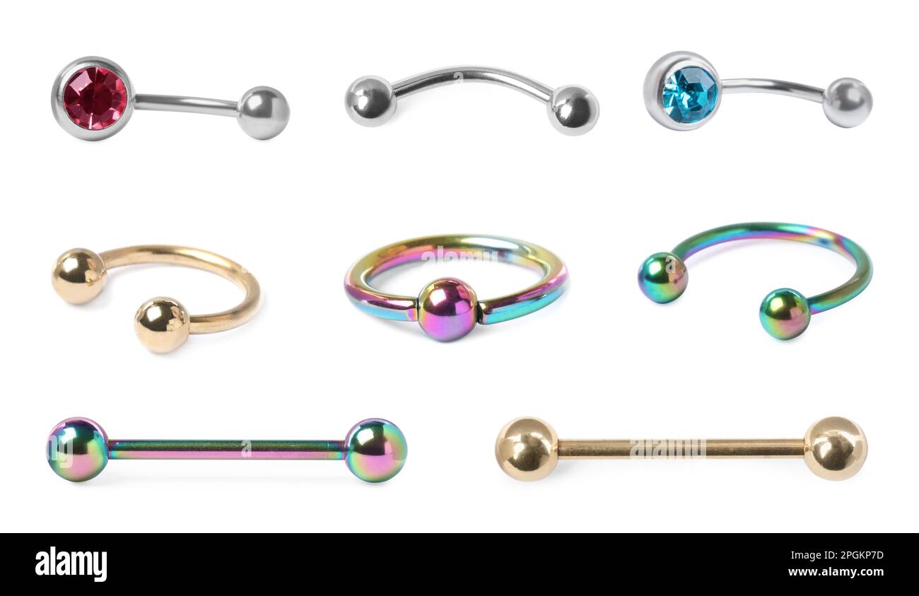 Set with different piercing jewelry on white background Stock Photo - Alamy