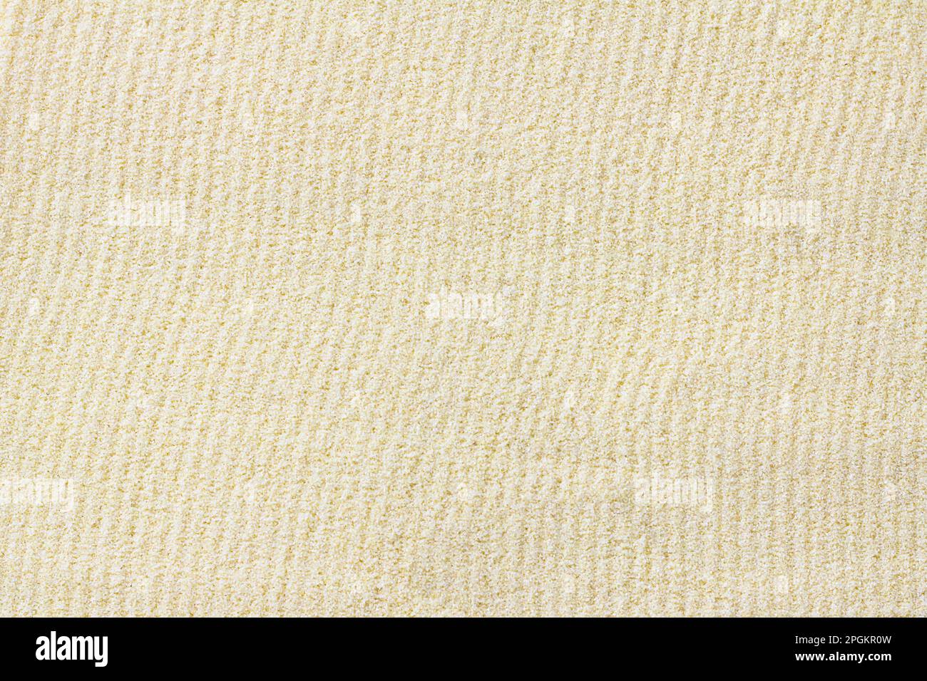 Raw dried semolina background, texture, vertical grooves, top view ...