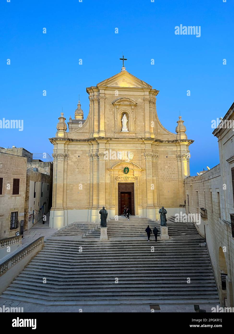 A vibrant vertical shot of the iconic Citadel Gozo church in Victoria ...
