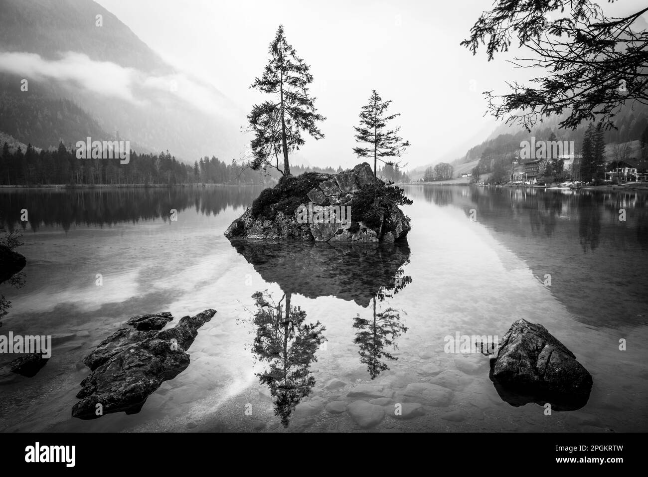 Trees on a rock island in BW - Lake Hintersee, Bavaria, Germany Stock ...