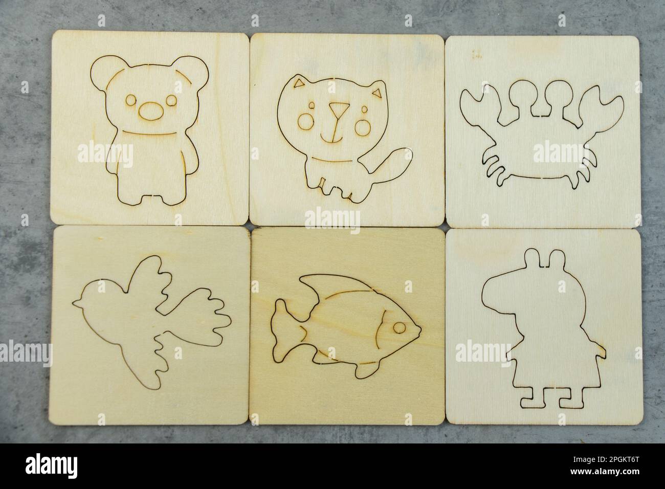 coloring toy, to be colored animals, wooden game Stock Photo - Alamy