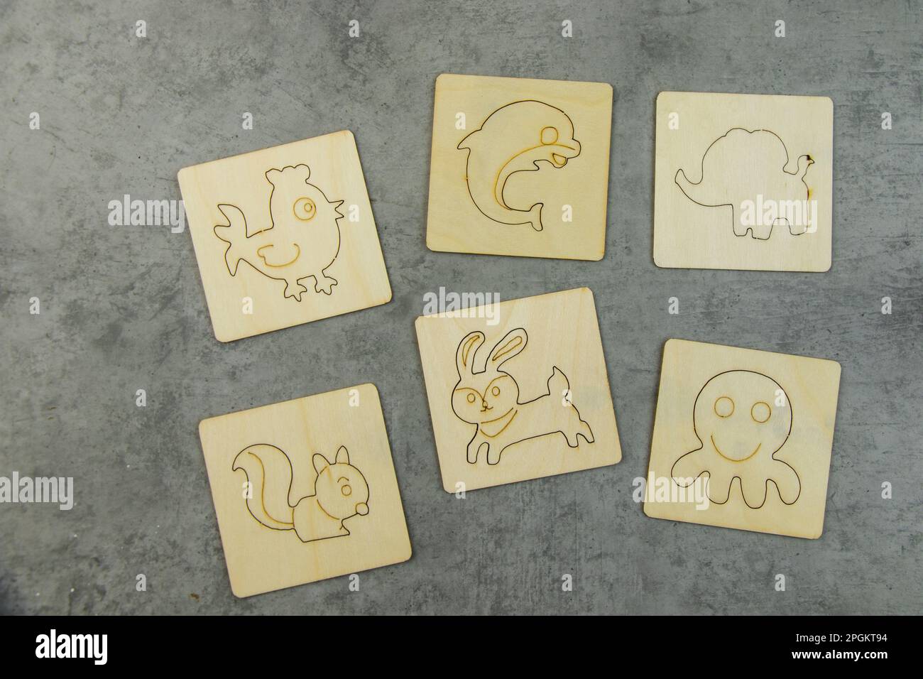 coloring toy, to be colored animals, wooden game Stock Photo - Alamy