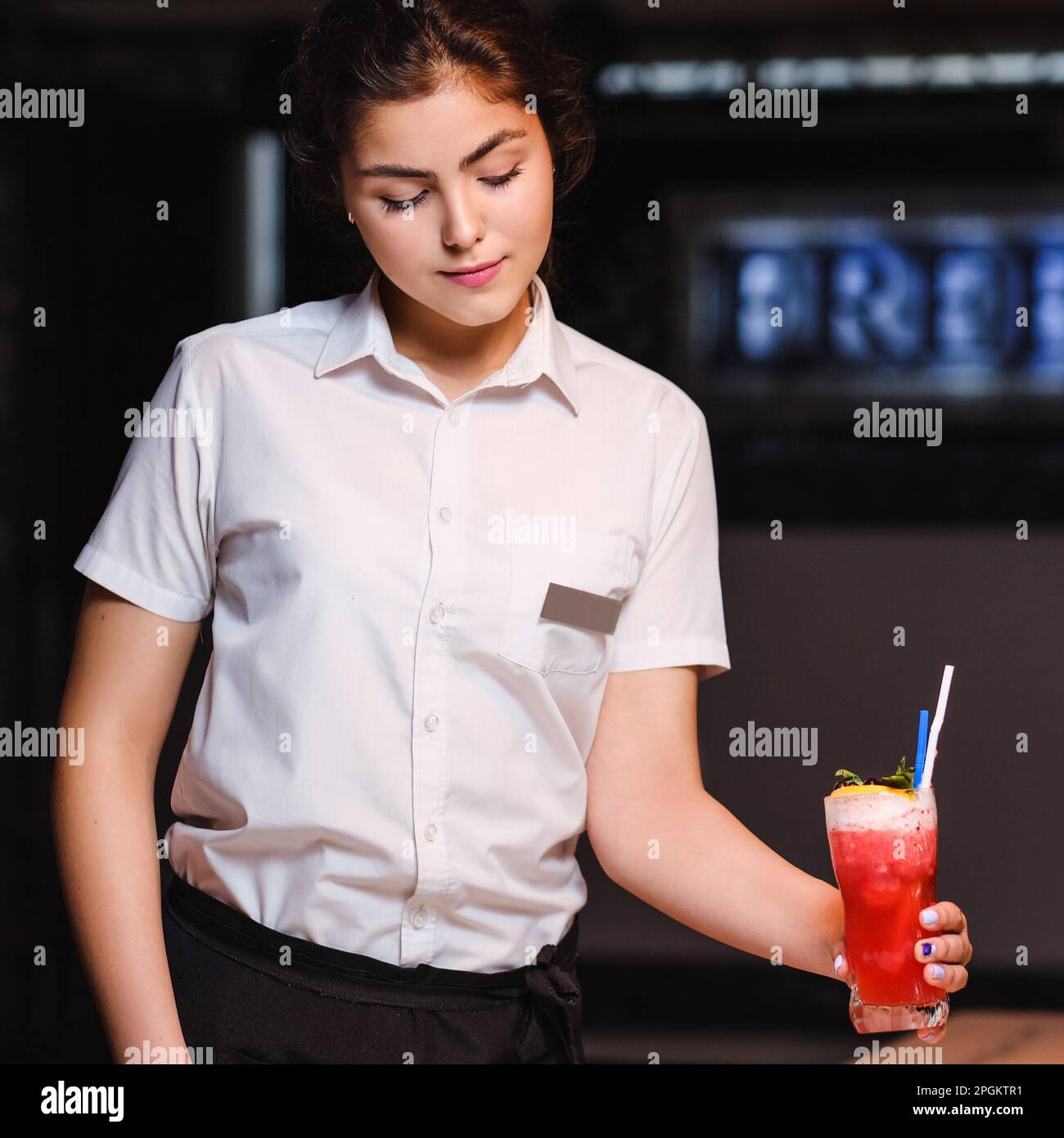 waitress serving cocktail professional bar service Stock Photo - Alamy