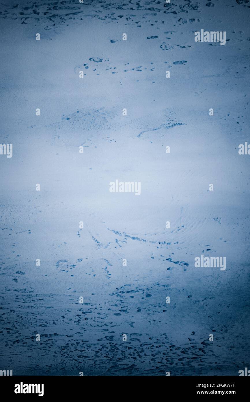 Gray blue textured background with the dark in the recesses, toned ...