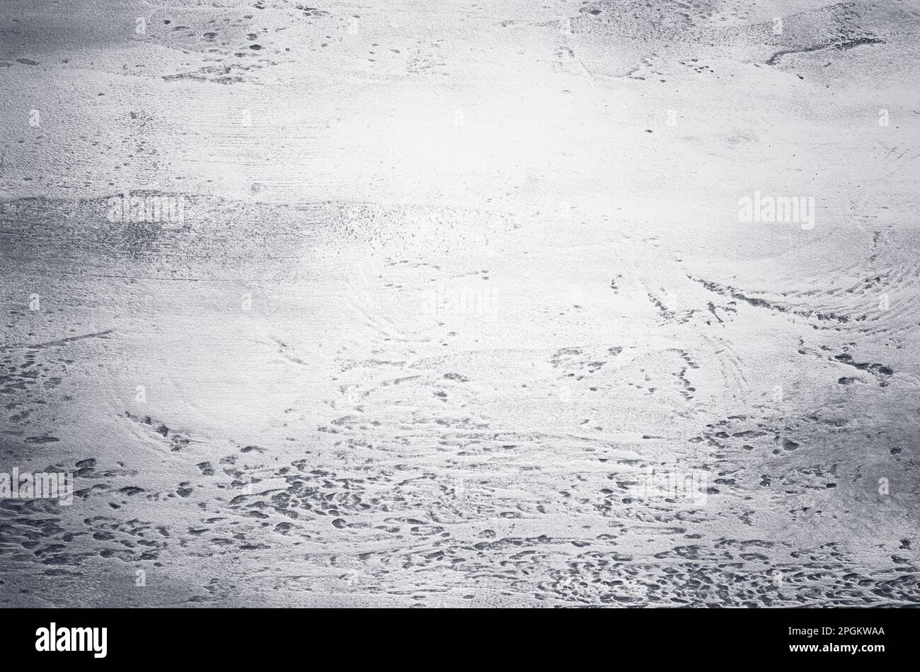 Gray textured concrete background with light base darker in the ...