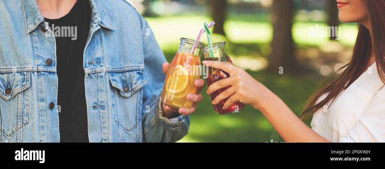 Healthy nutrition. Friends drinking detox tea Stock Photo - Alamy
