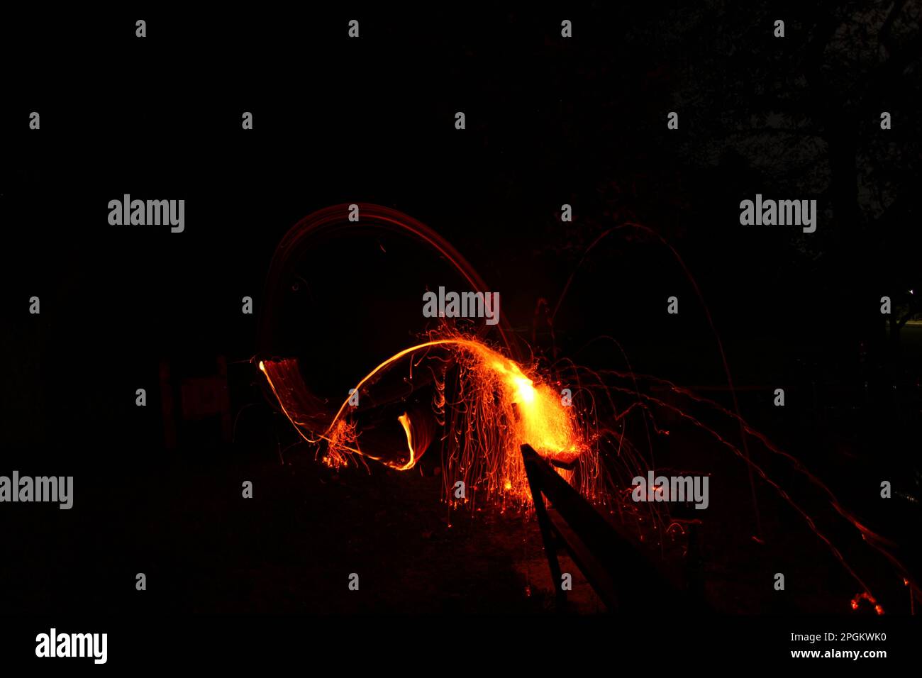 Flaming wood impacts on bench. fire-raising Stock Photo - Alamy