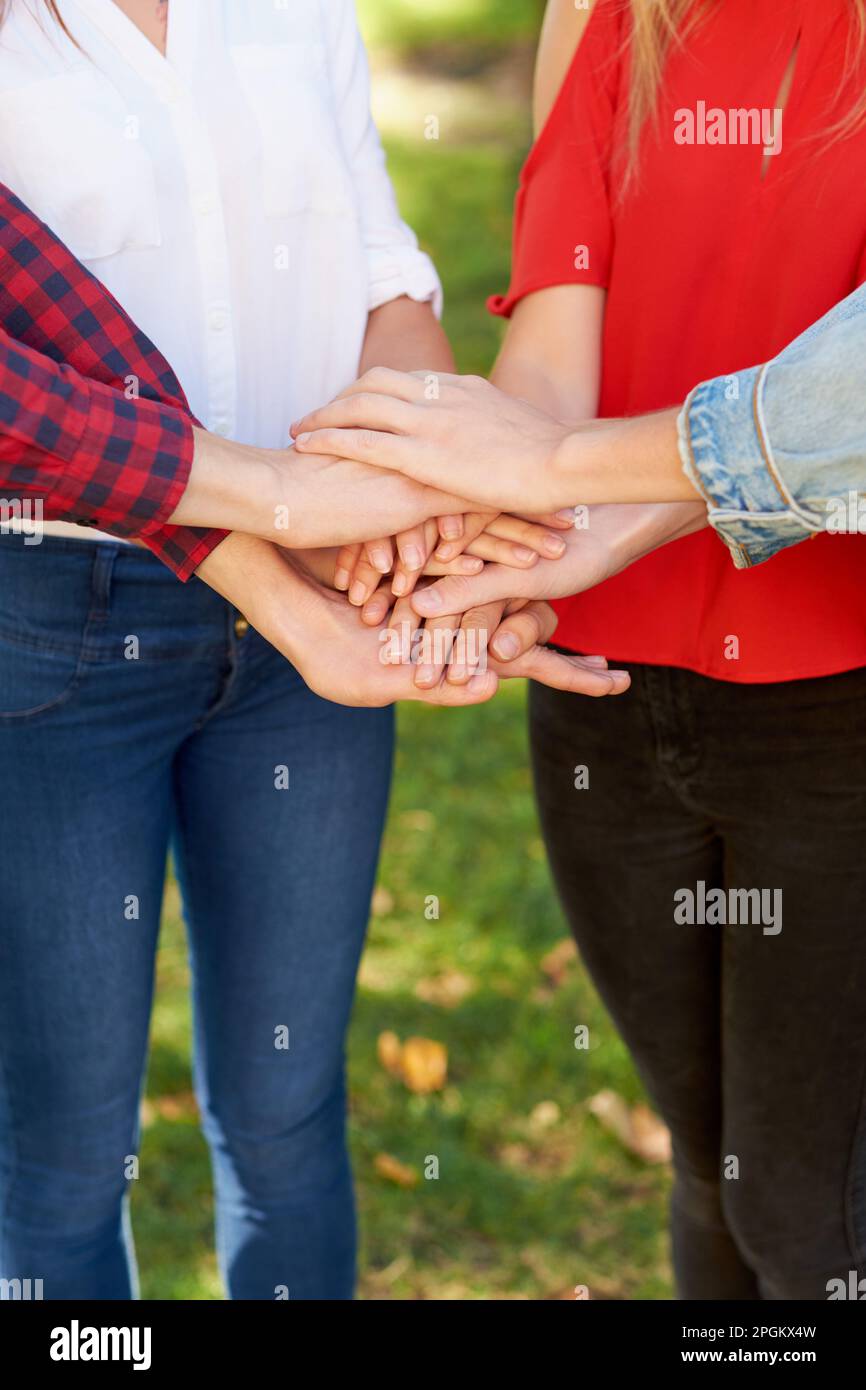 Student teamwork. Closeup of hans together stack Stock Photo - Alamy