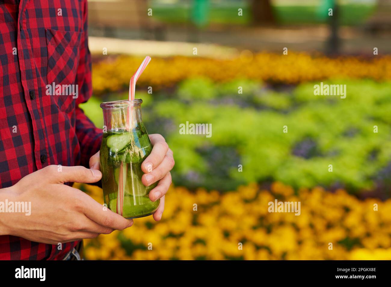 Healthy lifestyle. Happy young man with detox Stock Photo - Alamy