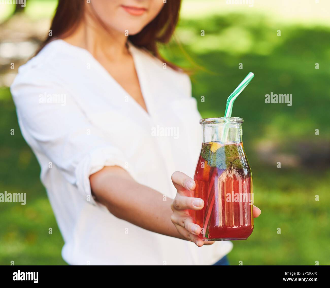 Healthy lifestyle. Happy young woman with detox Stock Photo - Alamy