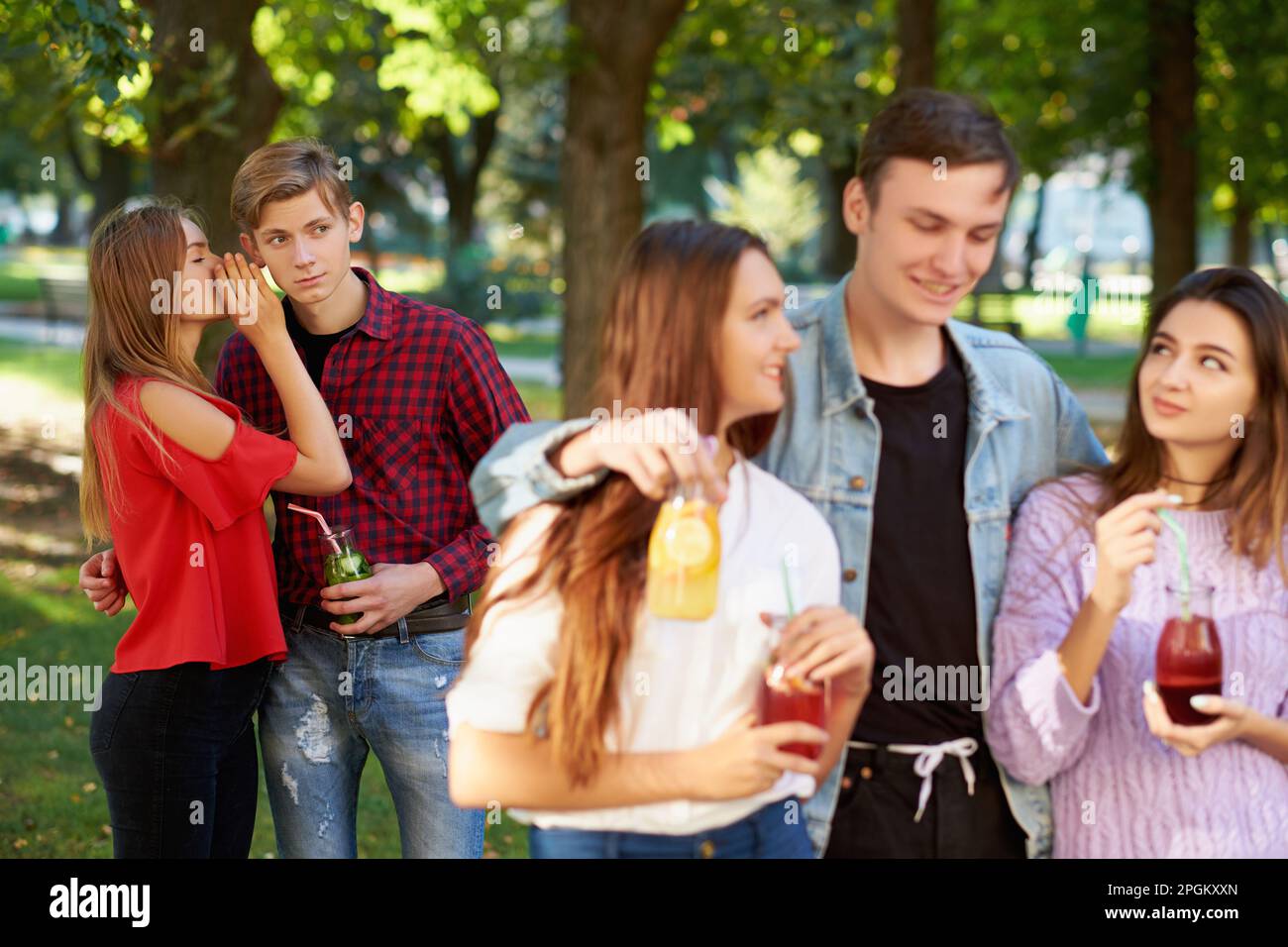 Jealousy and envy in friends relationship Stock Photo - Alamy