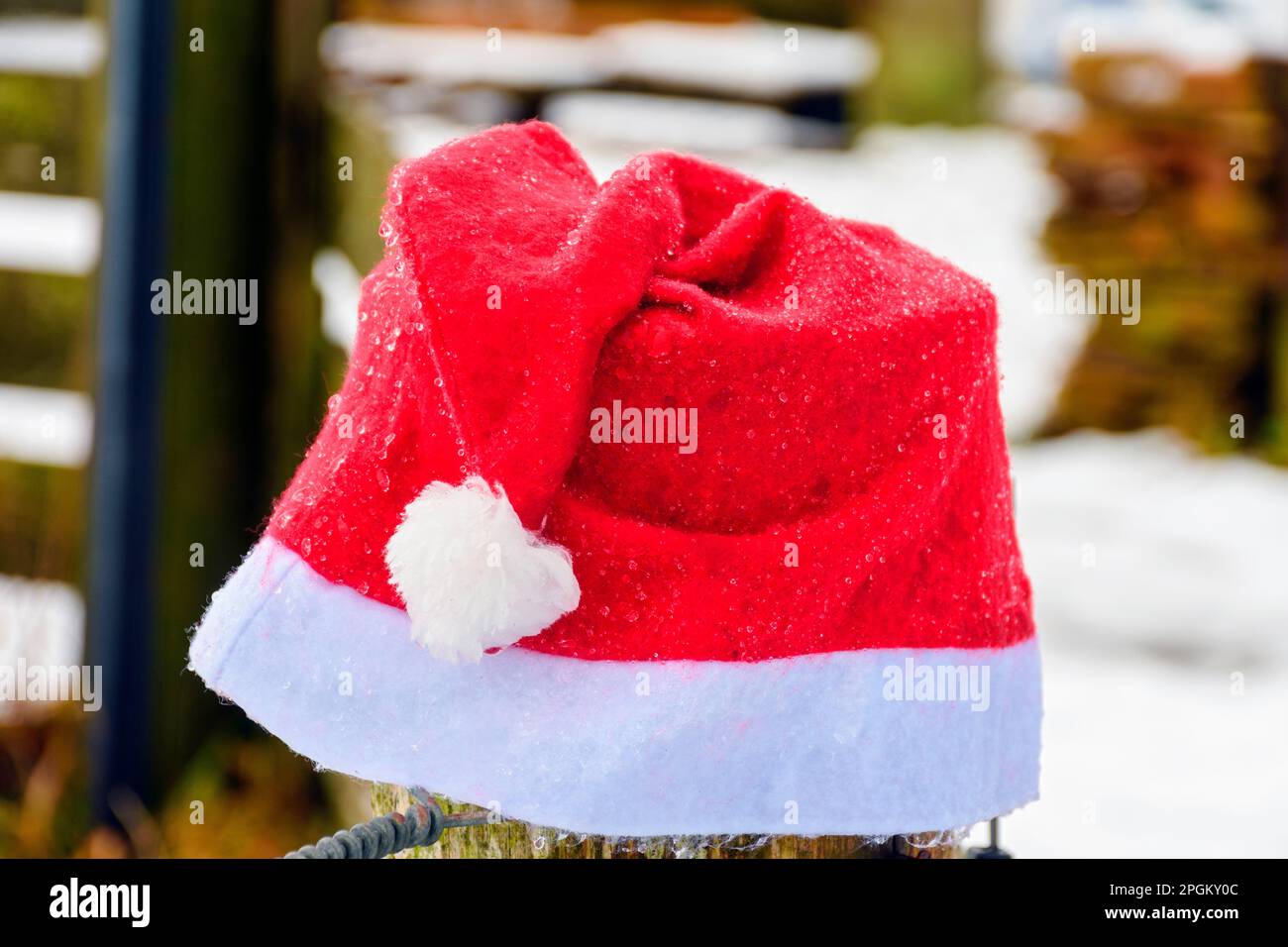 Santa hat on fence post hi-res stock photography and images - Alamy