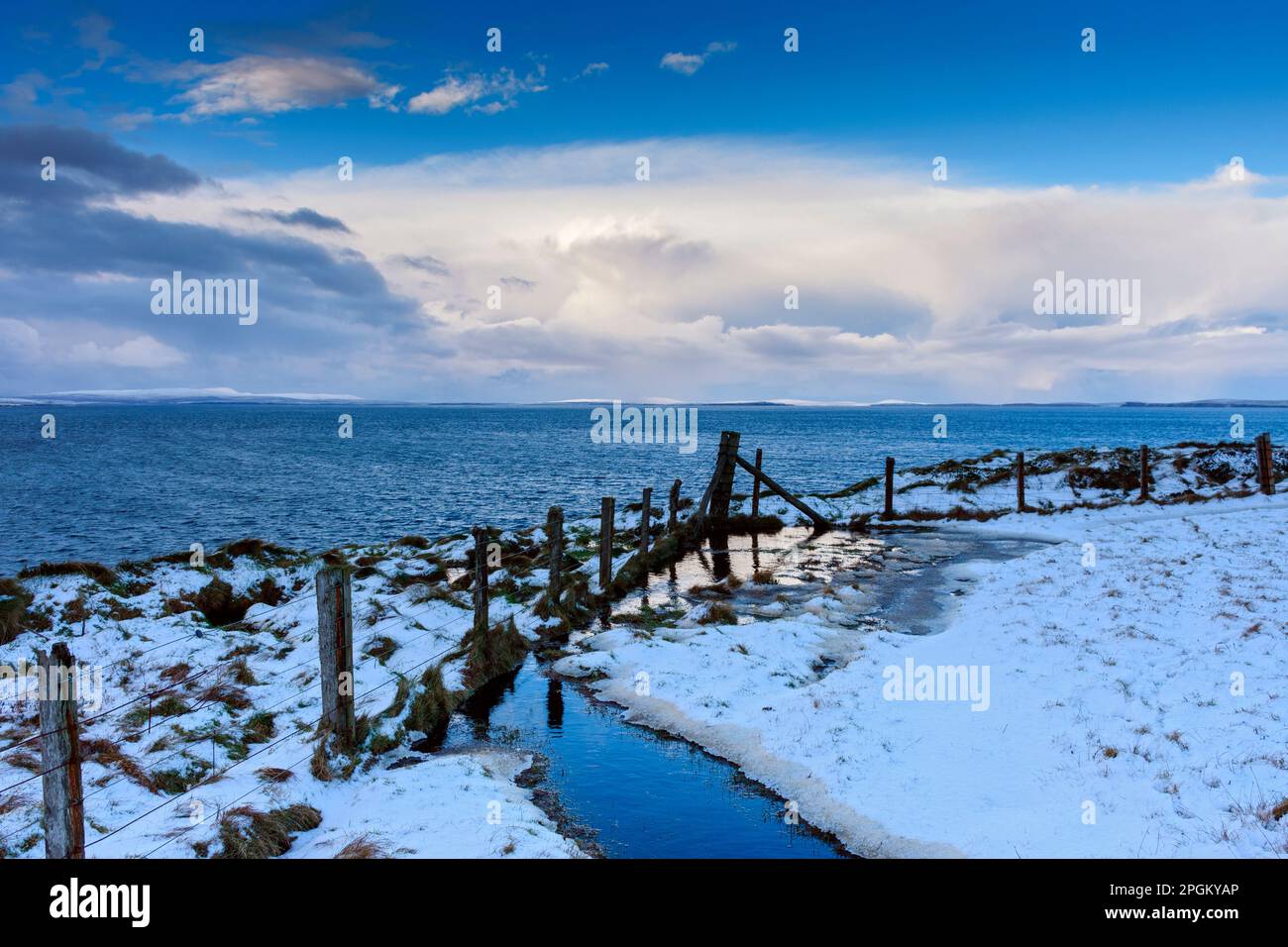 Cumulonimbus storm clouds over the Orkney Isles, viewed over the ...
