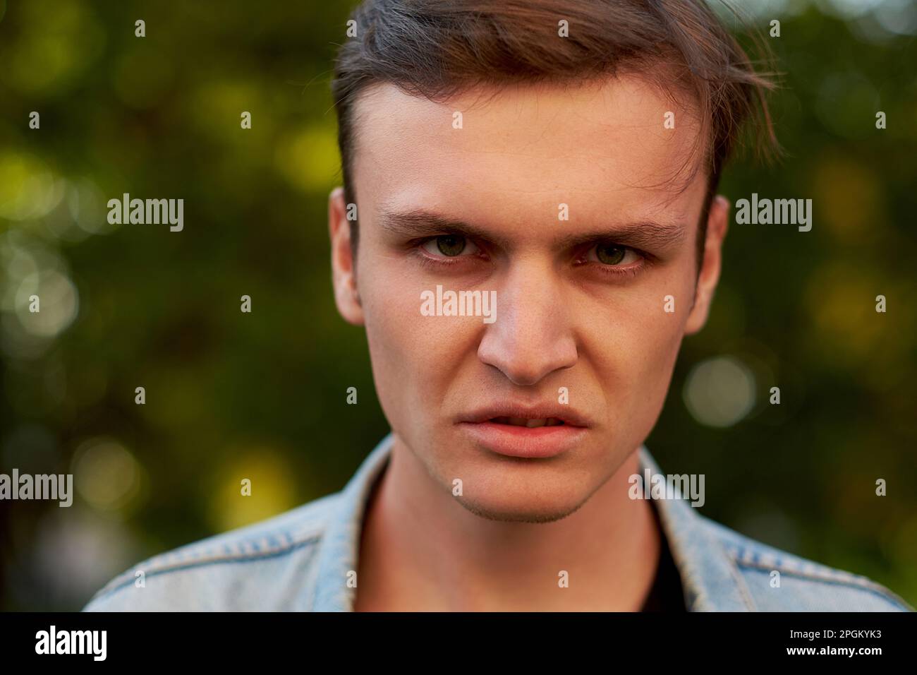 Angry aggressive man face Stock Photo - Alamy