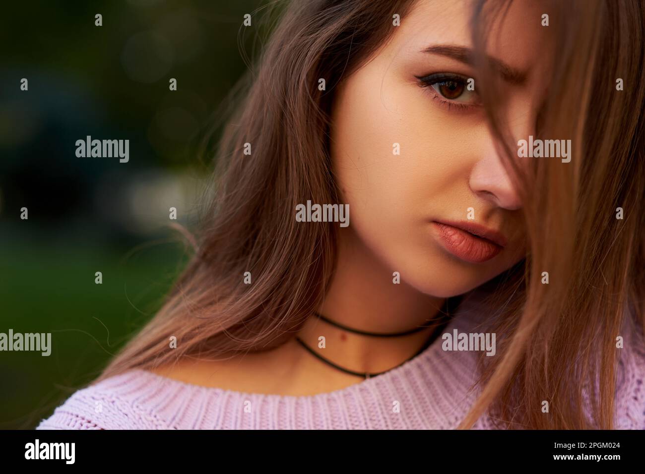 Shame and shyness facial expression Stock Photo - Alamy