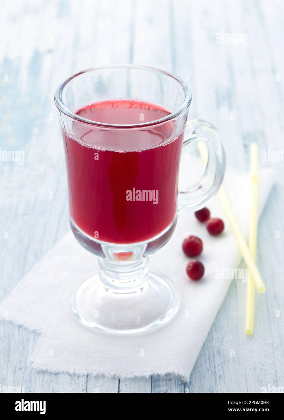 Fresh cranberry juice fruit drink on a light blue background Stock ...