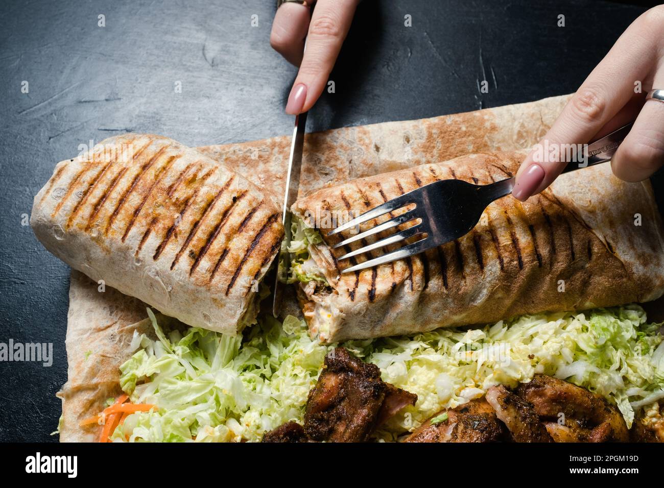 shawarma tasting traditional cuisine fast food Stock Photo - Alamy