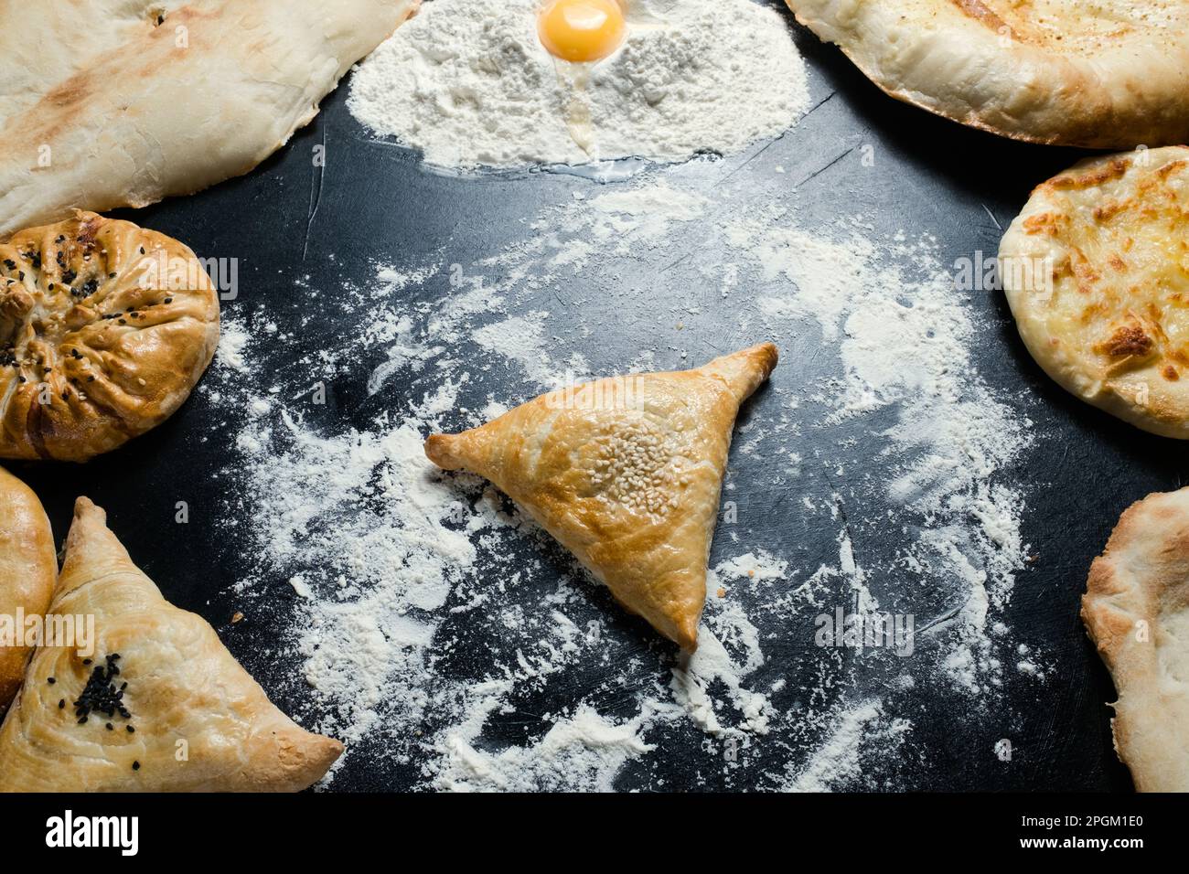 samosa uzbek puff pastry ethnic fast street food Stock Photo - Alamy
