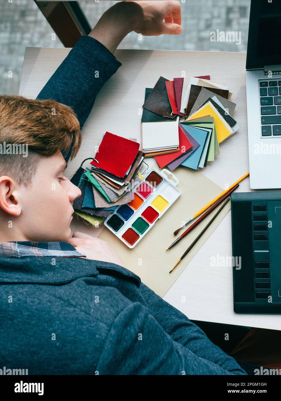 Stressed tired graphic designer hi-res stock photography and images - Alamy