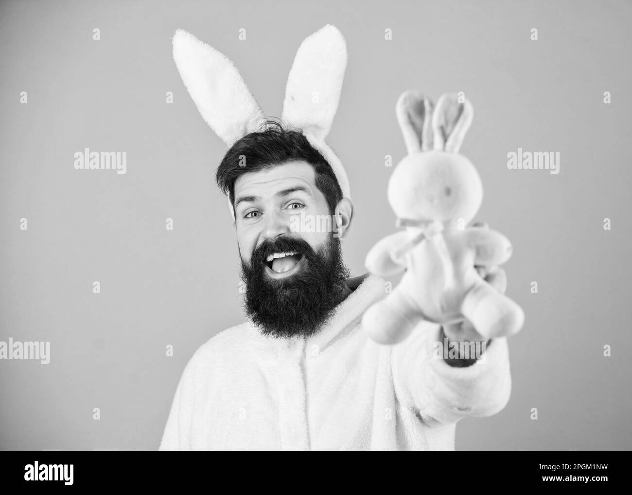Easter bunny. Having fun. Funny bunny with beard and mustache. Join celebration. Bearded man ...