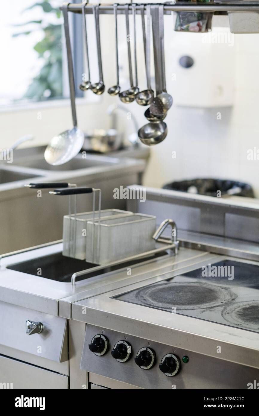 kitchen restaurant workspace cooking appliances Stock Photo - Alamy