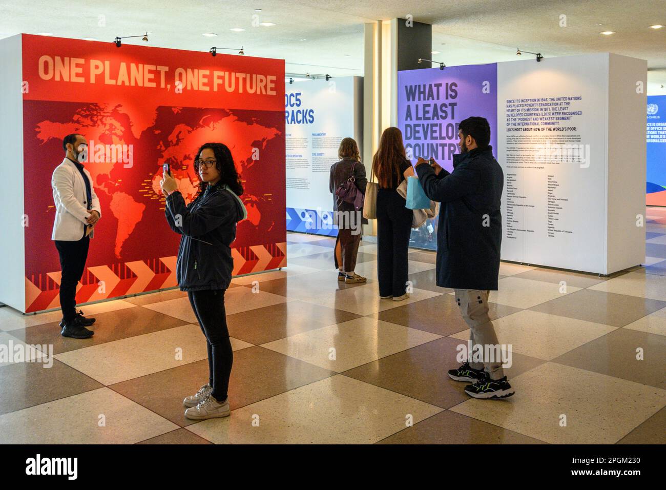 New York, USA. 23rd Mar, 2023. Delegates visit a display set up at the ...