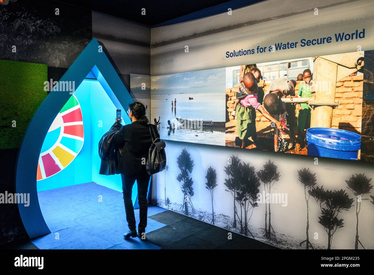 New York, USA. 23rd Mar, 2023. Delegates visit a display set up at the ...