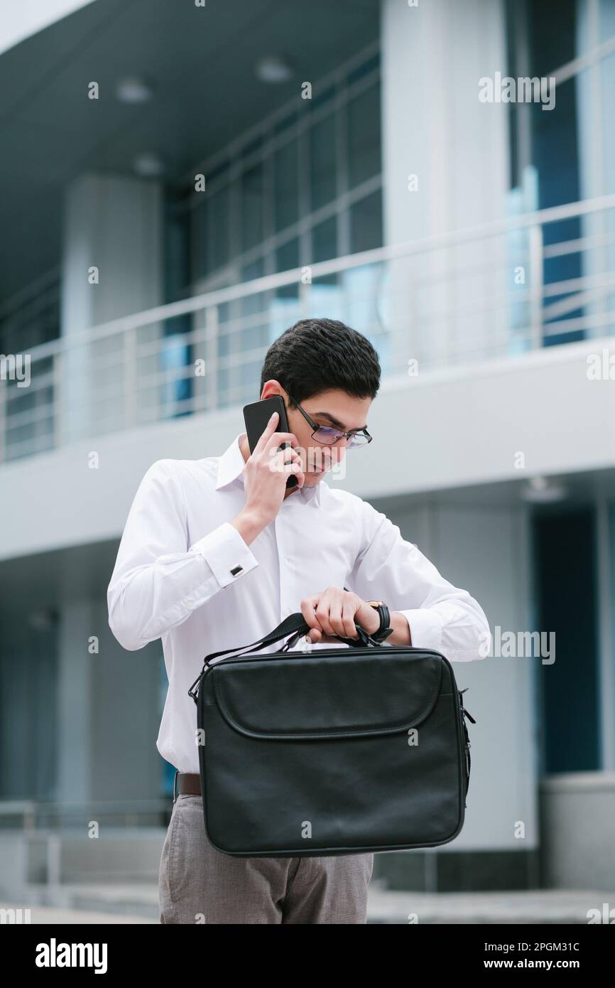 time management man looking business schedule Stock Photo - Alamy