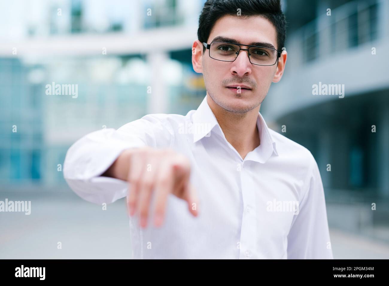 defiance challenge provocation confident man point Stock Photo - Alamy