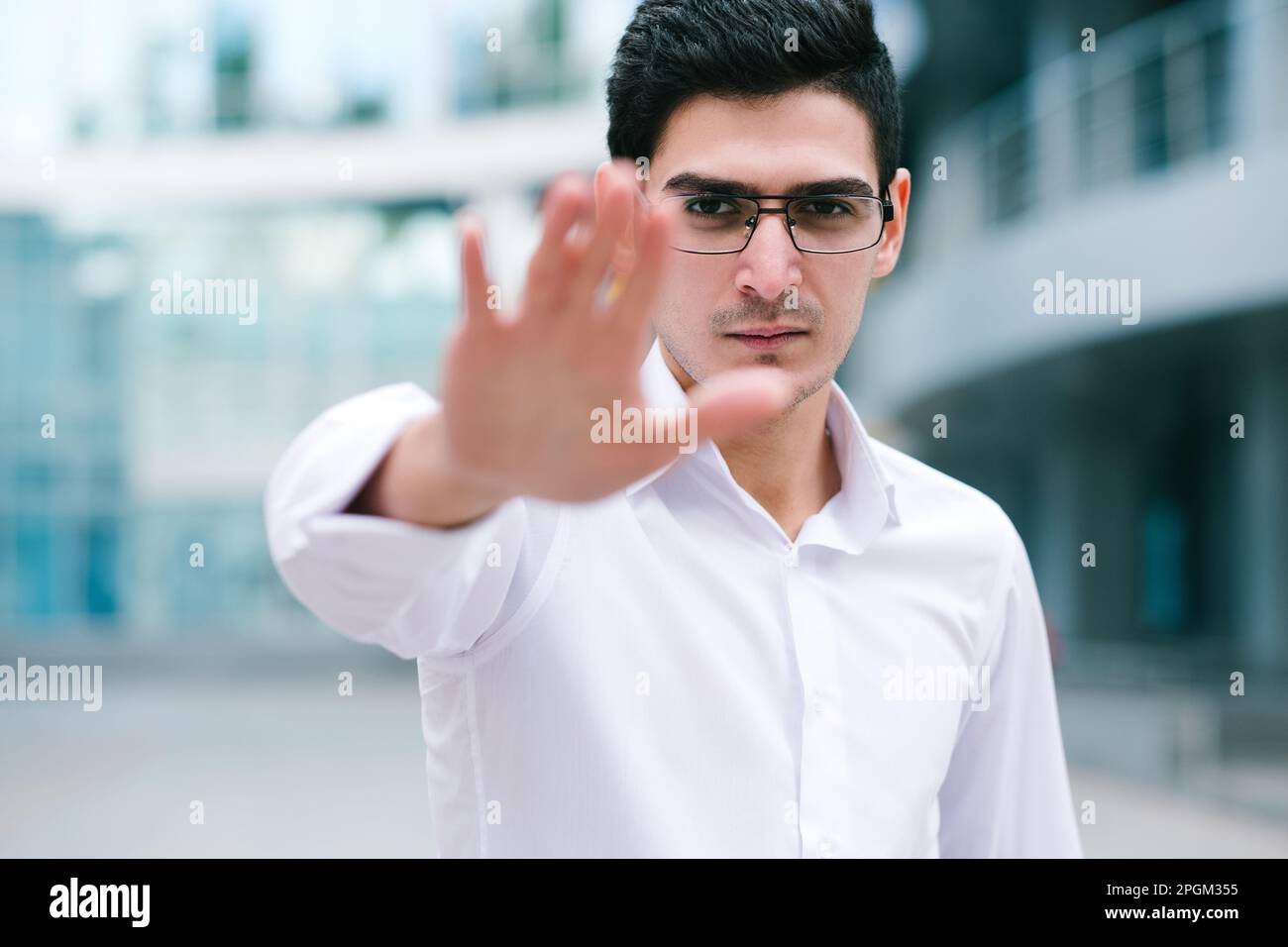 Stop gesture young man outdoor hi-res stock photography and images - Alamy
