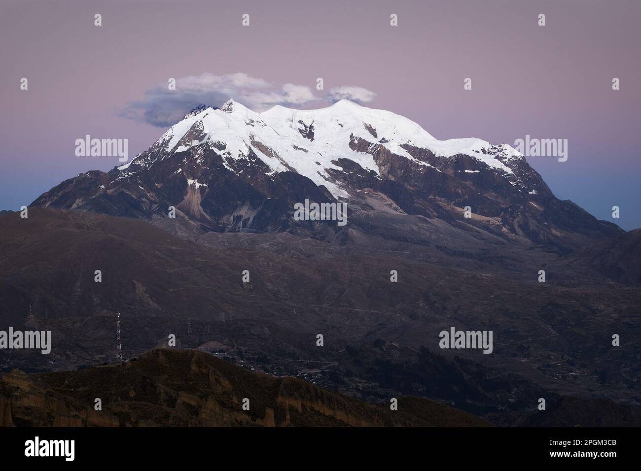 The view of snow-capped Illimani mountain with clouds floating above ...