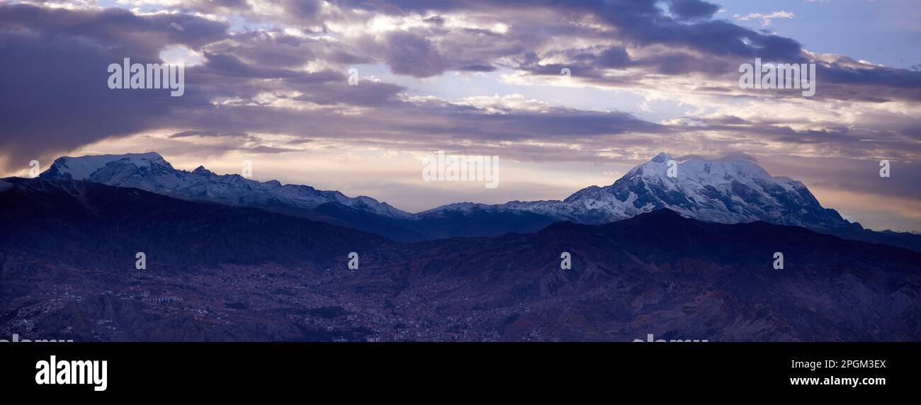 The view of snow-capped Illimani mountain with clouds floating above ...