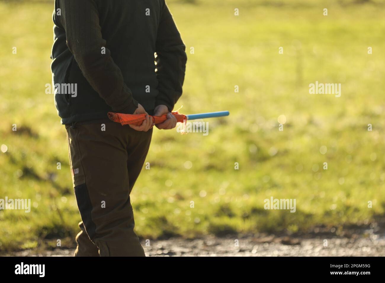 A man beating on a shoot in the countryside Stock Photo - Alamy