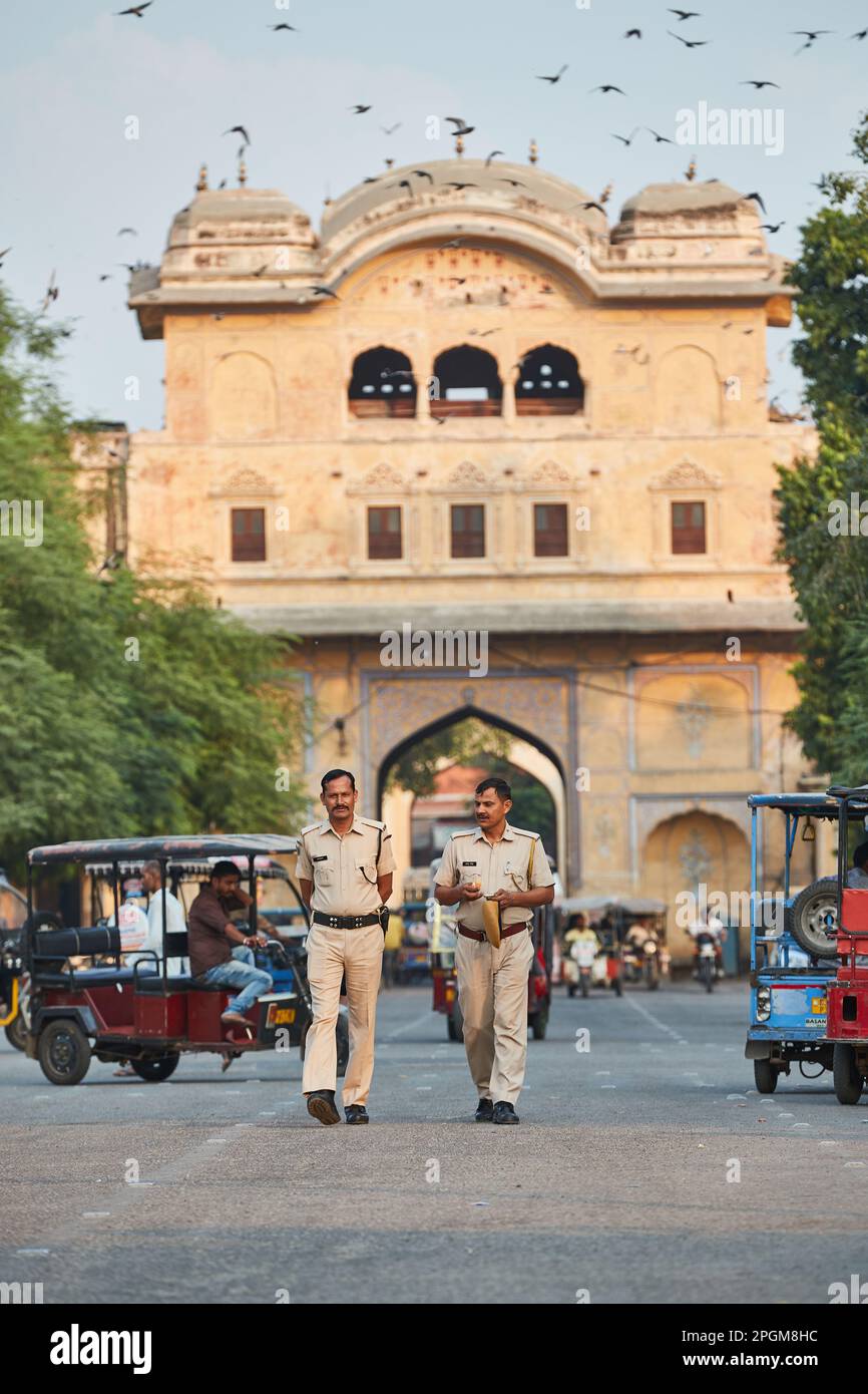 Jaipur, Rajasthan, India - two policemen walking in front of historic ...