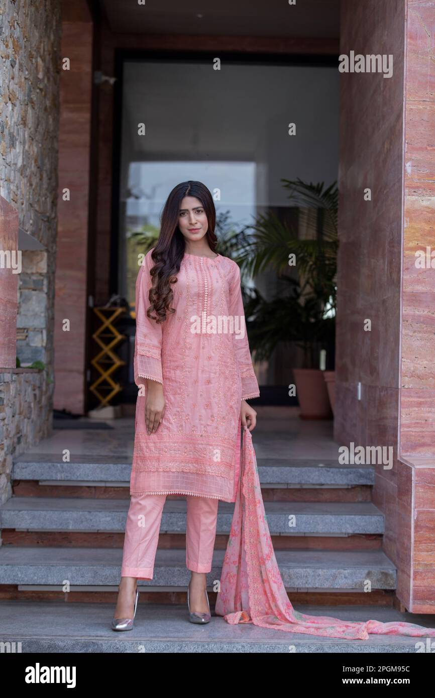 Female model posing outdoors wearing summer dress Indian Pakistani ...