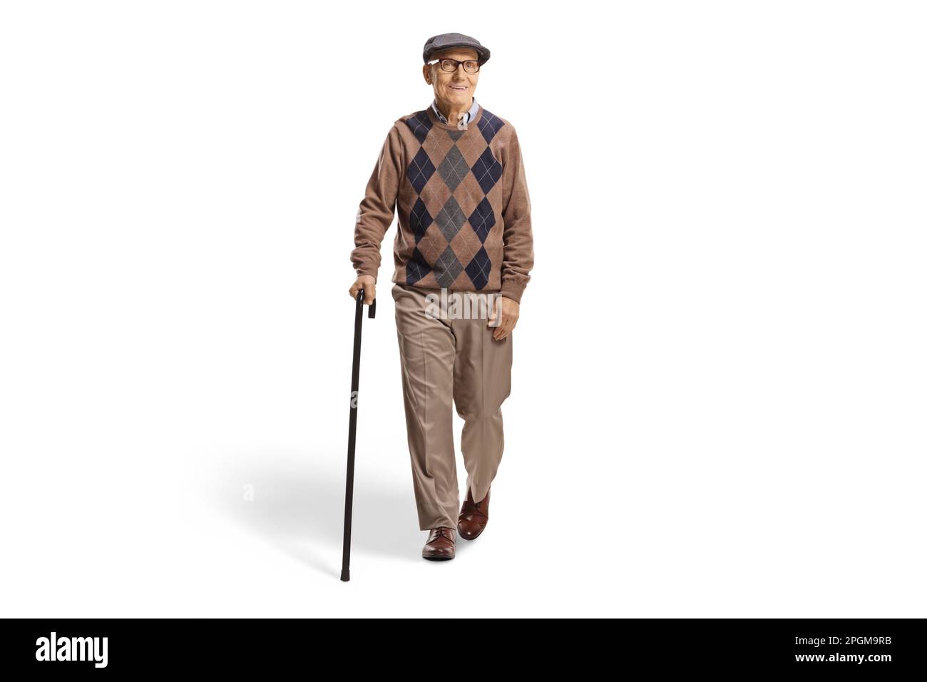 Full length portrait of an elderly man with a cane walking towards ...