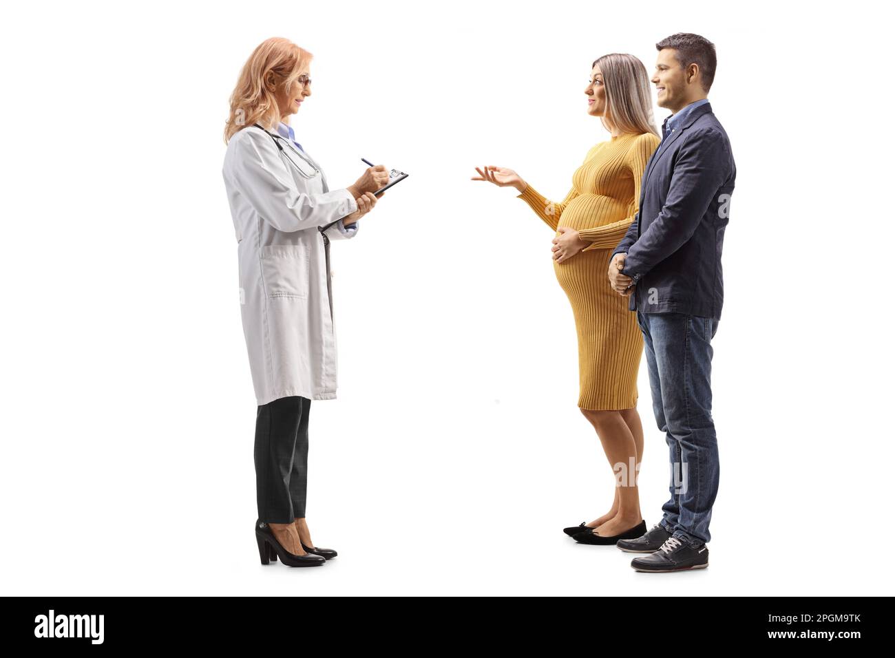 Full length profile shot of an expecting couple standing with a female ...
