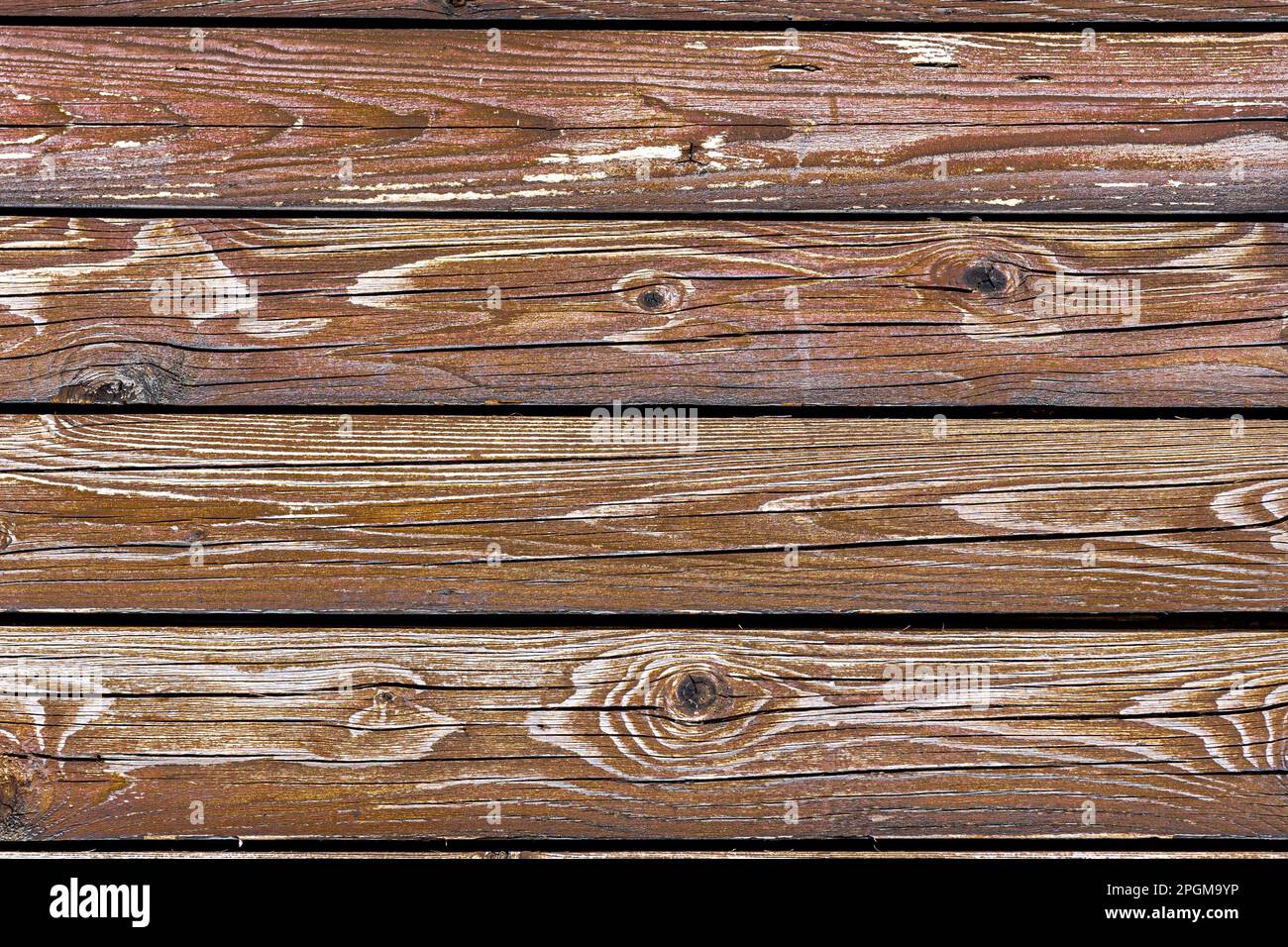Wall background of aligned wooden logs Stock Photo - Alamy