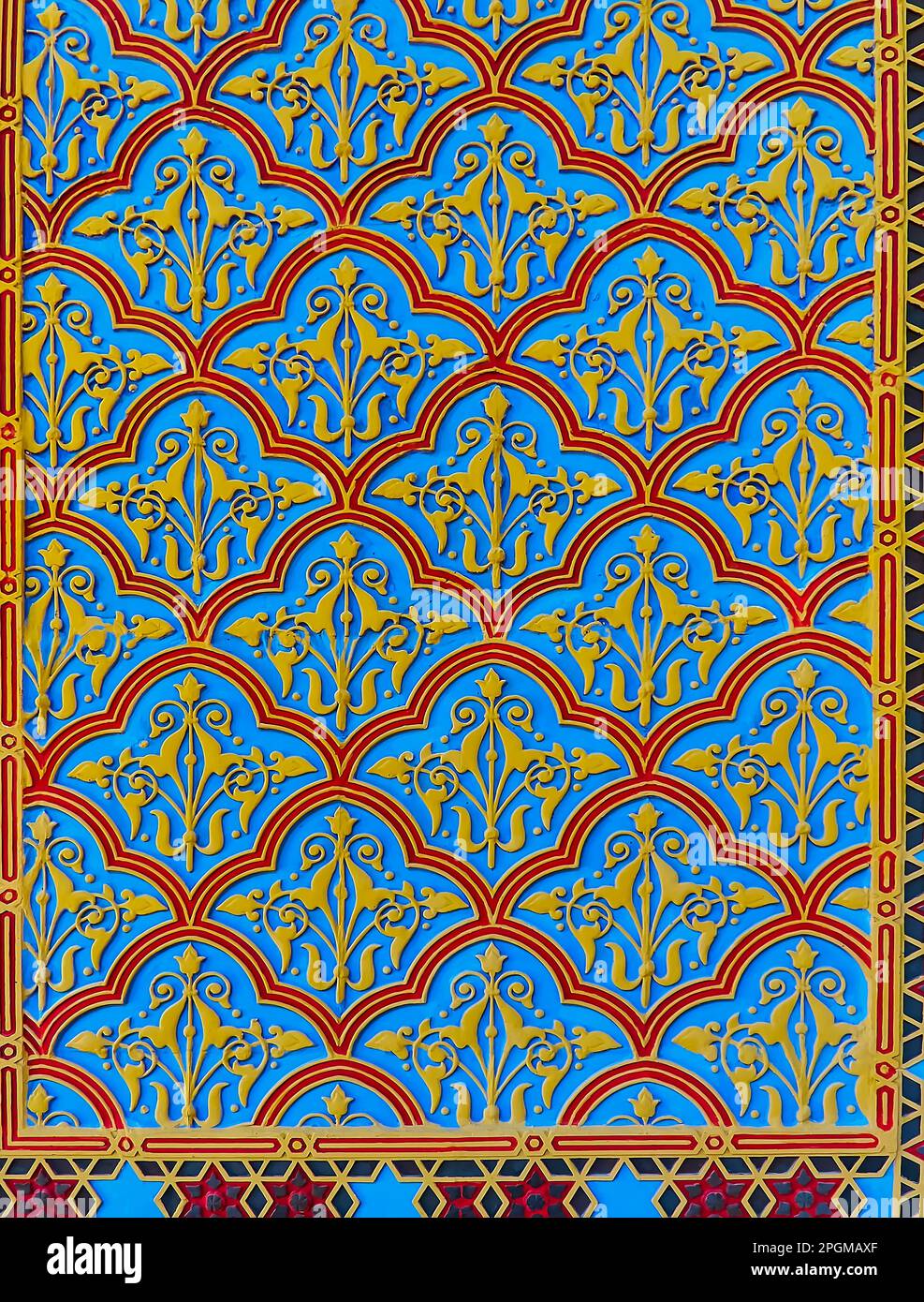 The bright blue, yellow and red stucco patterns on wall of Rumbach ...