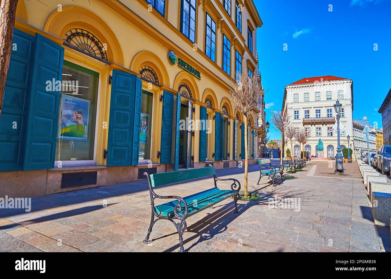 BUDAPEST, HUNGARY - FEB 22, 2022: The wooden benches on Barczy Istvan ...