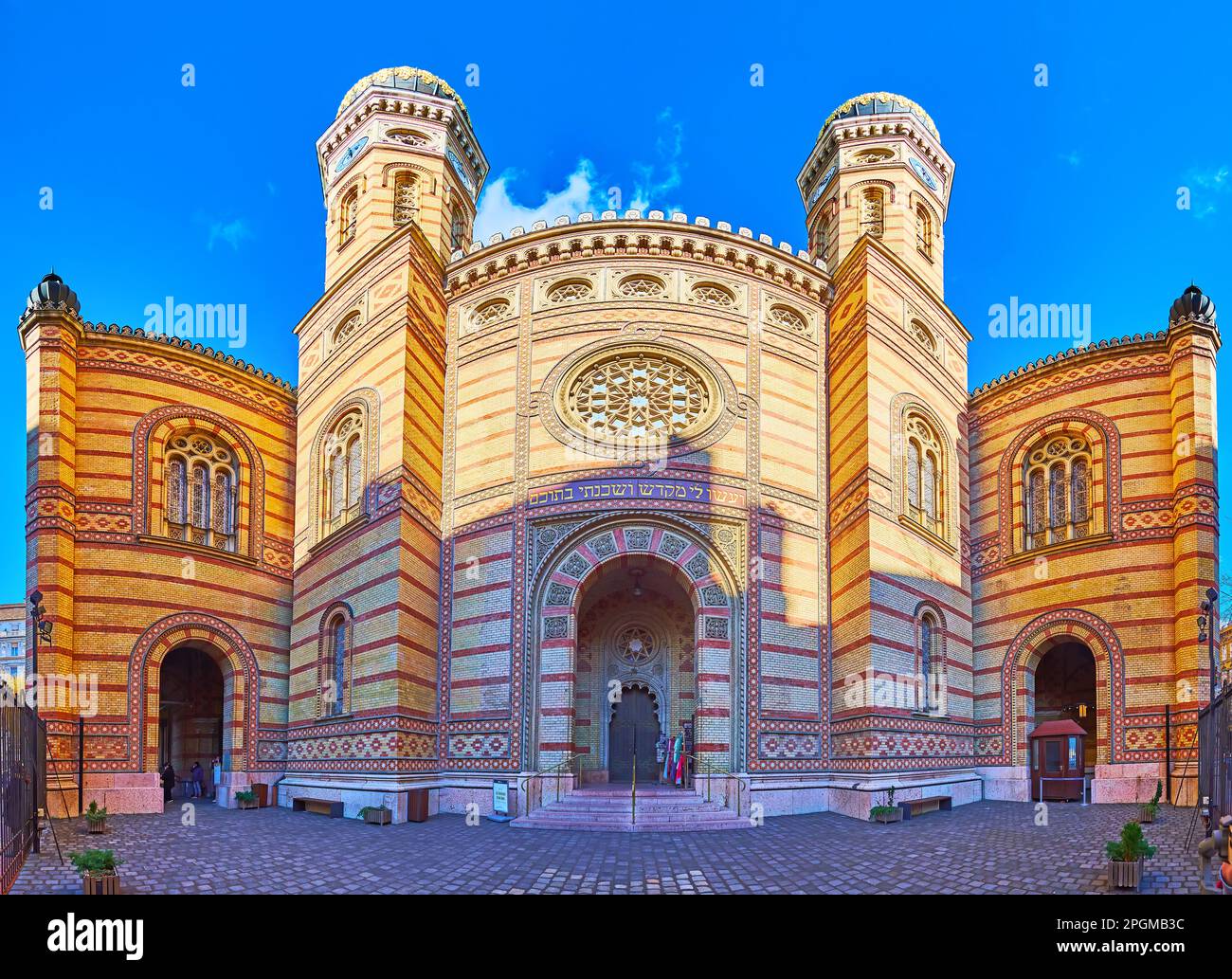 Panoramic facade of Dohany Street Synagogue with patterns of colored ...
