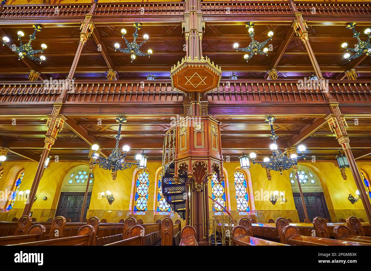 BUDAPEST, HUNGARY - FEB 22, 2022: The Gothic style carved wooden pulpit ...