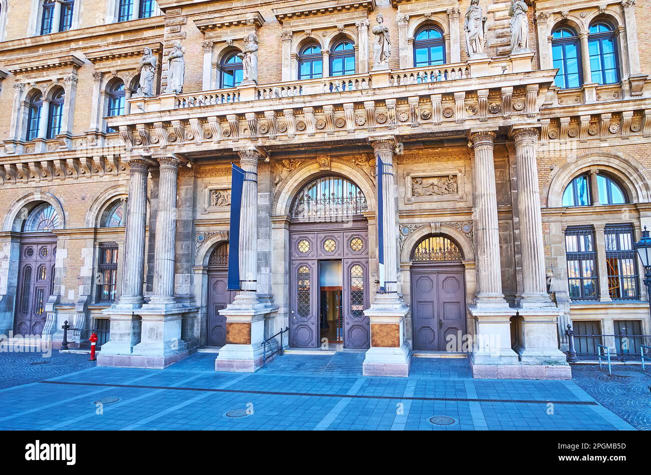 The stone porch of Corvinus University, decorated with carved columns ...