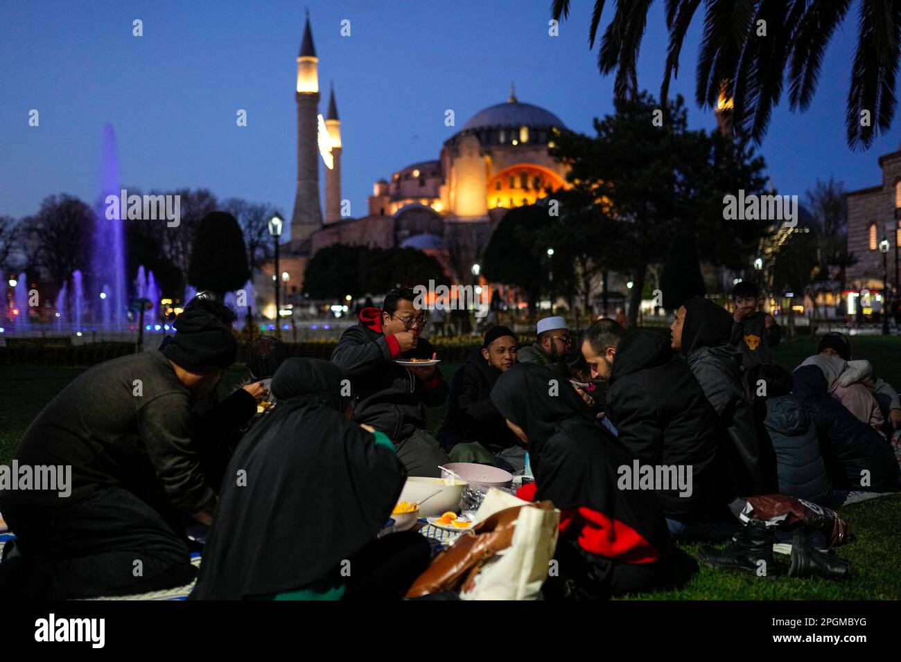 People break their fast after dusk on the first day of Ramadan ...