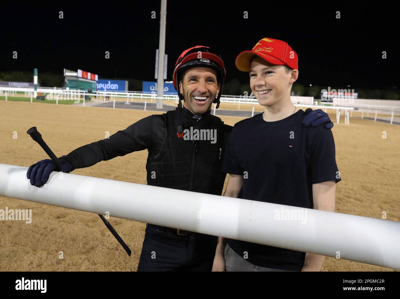 Jockey Neil Callan with his son Henry at Meydan Racecourse, Dubai ...