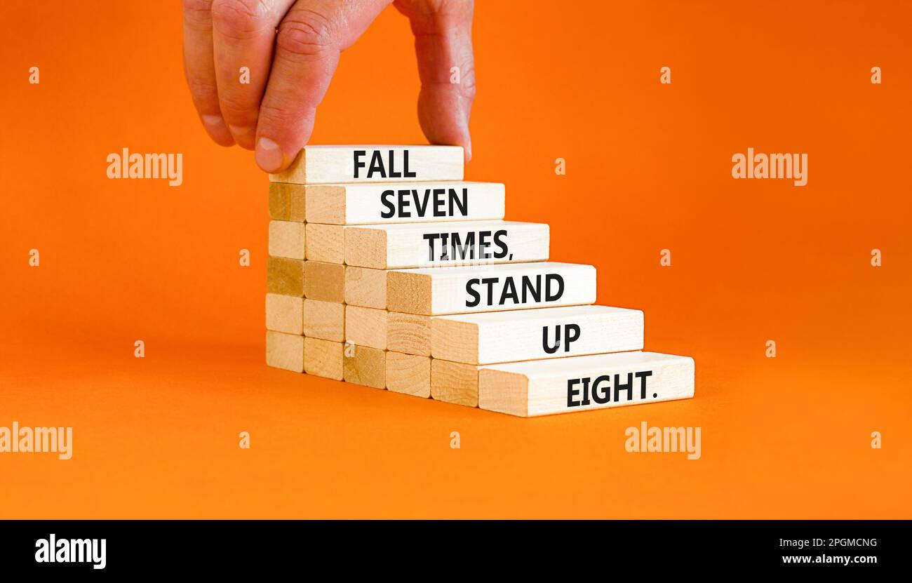 Stand up symbol. Concept words Fall seven times stand up eight on ...