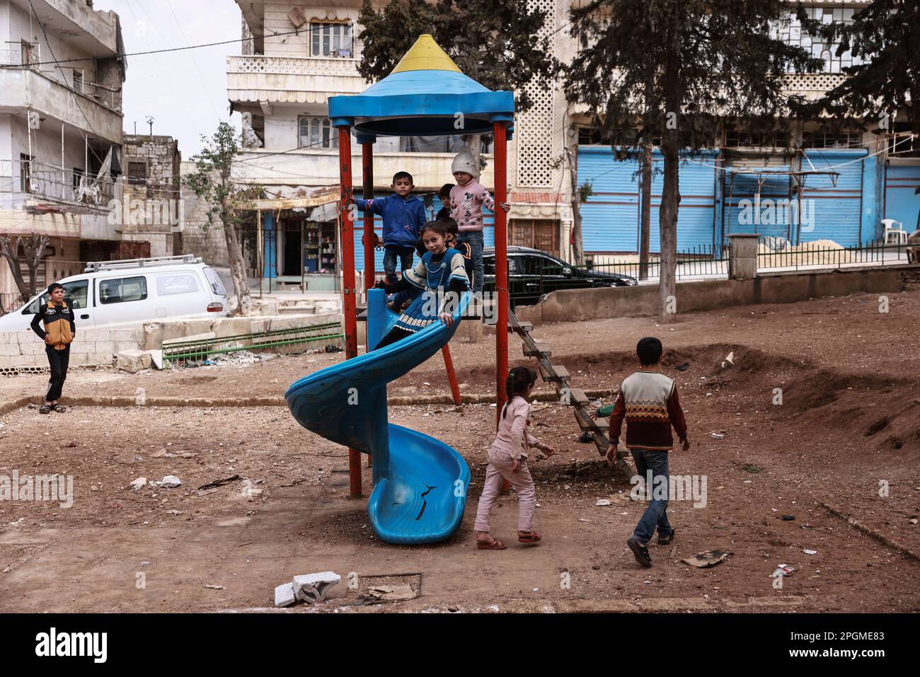 Ariha, Syria. 23rd Mar, 2023. Children play in a public park in Ariha ...
