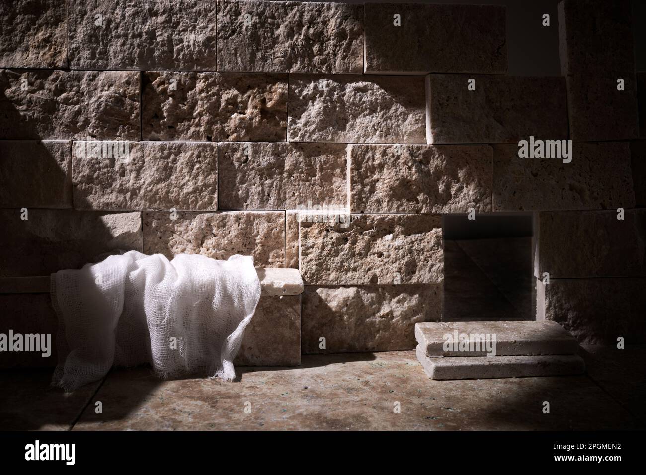 Empty tomb while light shines from the outside. Jesus Christ ...