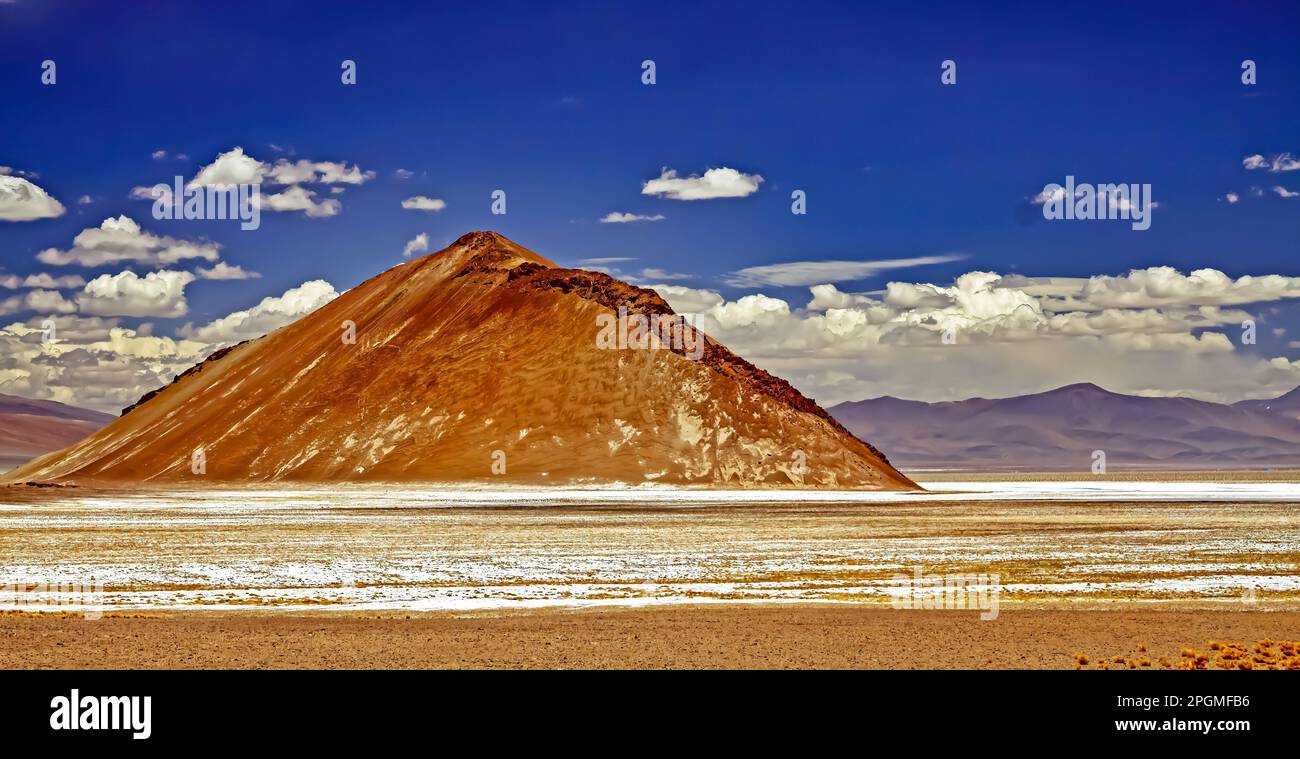 Beautiful impressive vast desert landscape, lonely single red mountain ...